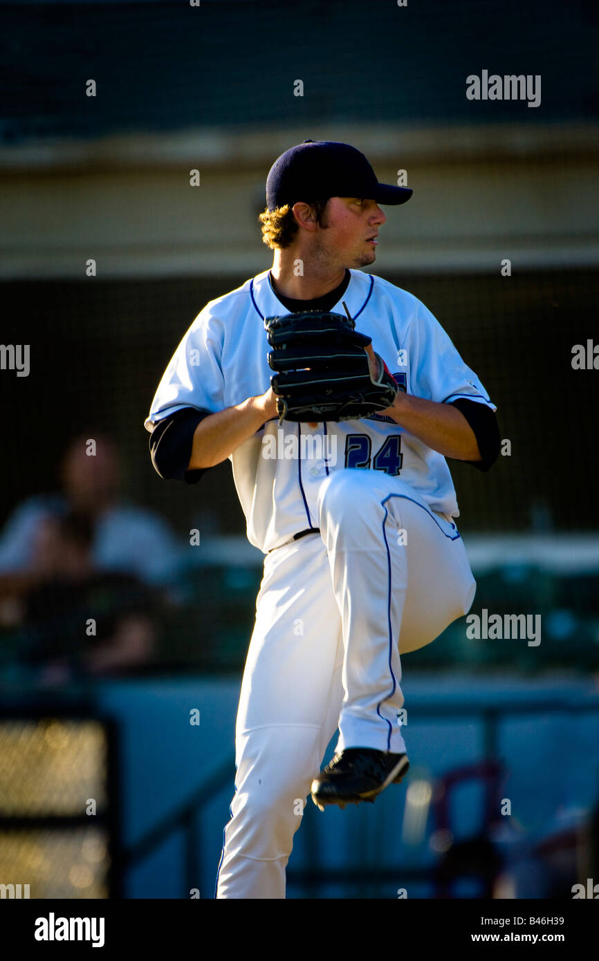 Baseball player winding up to pitch Stock Photo - Alamy