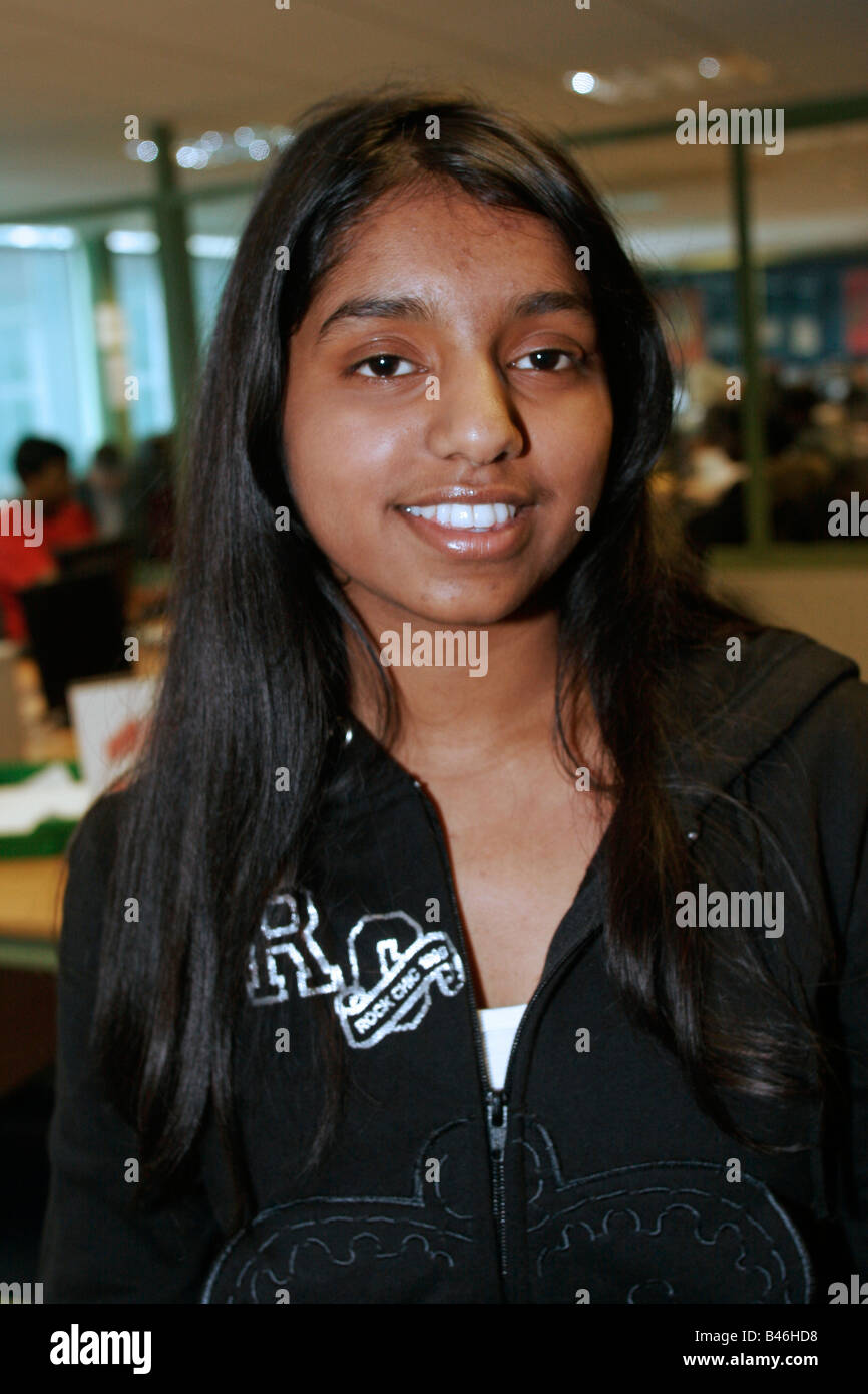Sixth form college female student smiling to camera Stock Photo - Alamy