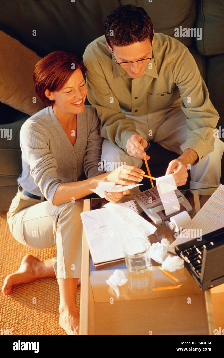 Couple doing Finances Stock Photo - Alamy