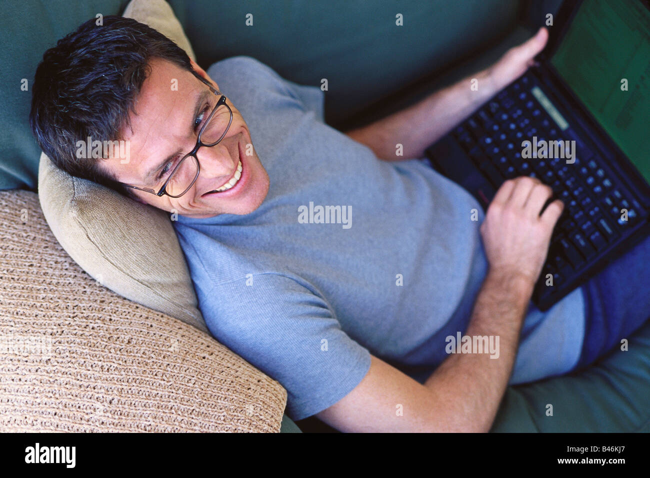 Man Using Laptop Computer Stock Photo - Alamy