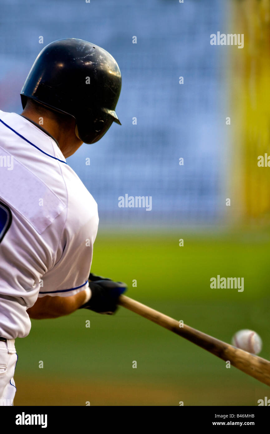 Rear view of a baseball player at bat Stock Photo - Alamy