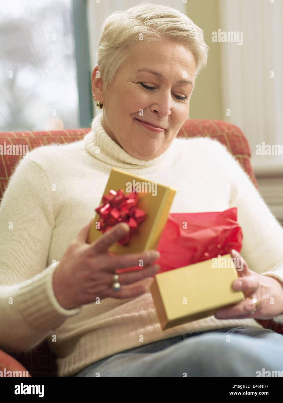 Present opening and tissue hi-res stock photography and images - Alamy