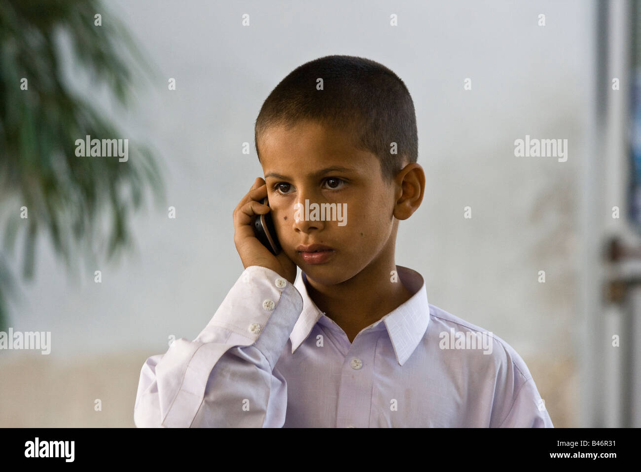 Boy Using a Mobile Phone in Yazd Iran Stock Photo - Alamy
