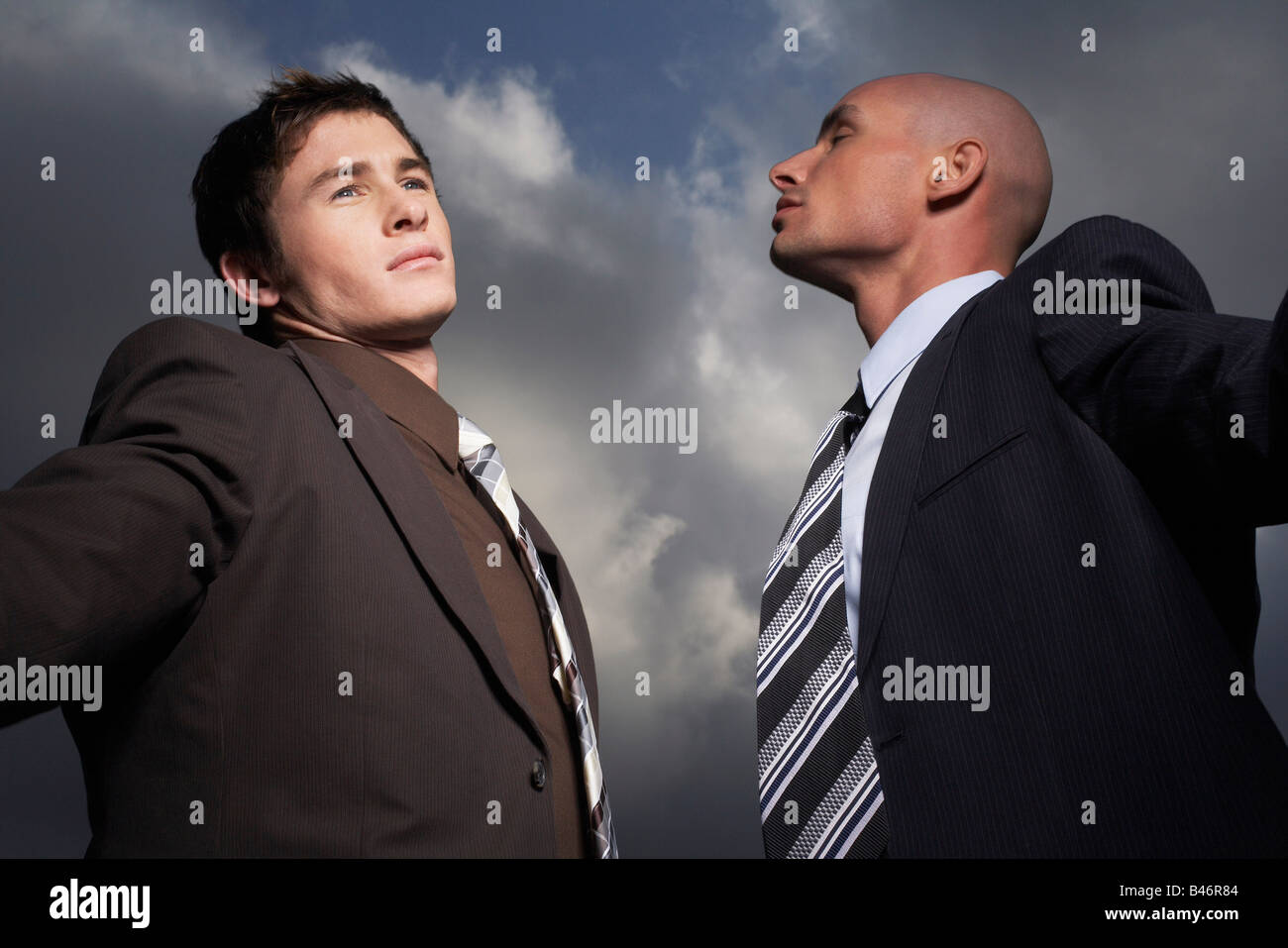Guy With Arms Up Suit High Resolution Stock Photography and Images - Alamy