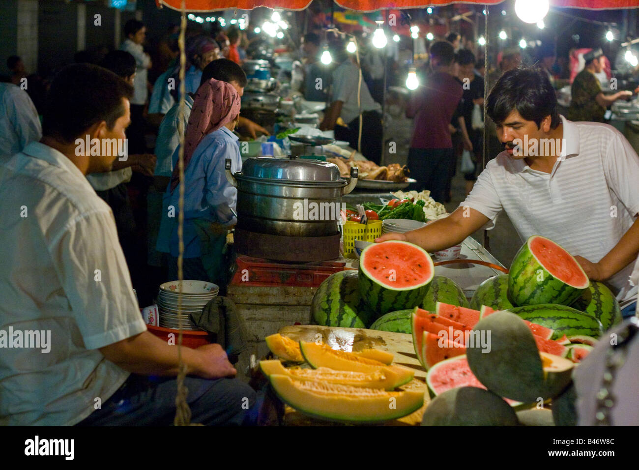 Selling Watermelon by the Slice in the Hotan Night Market in Hotan in ...