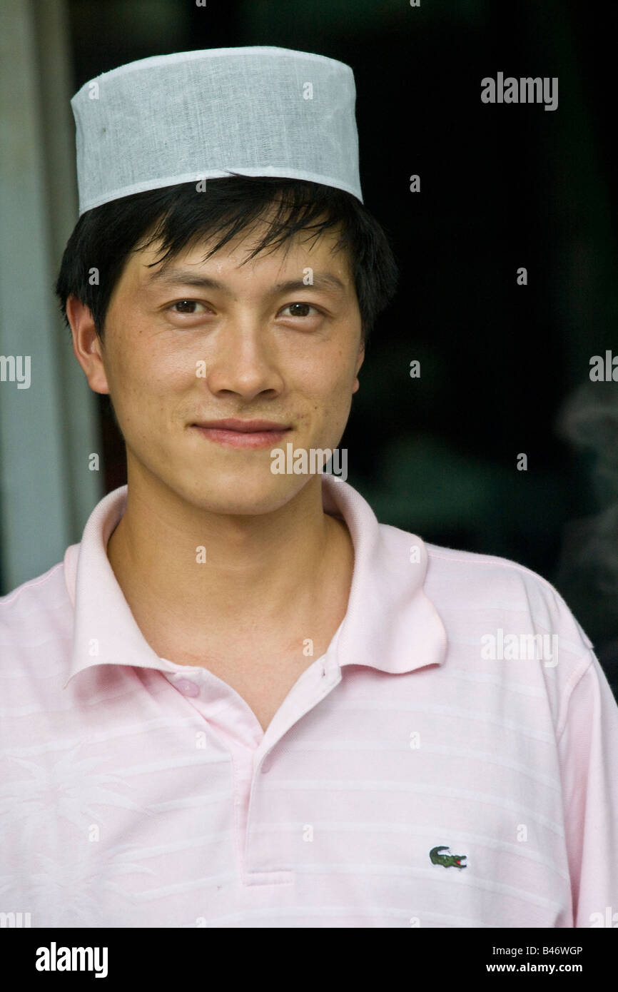 Young Man in the Muslim Quarter in Xian China Stock Photo - Alamy