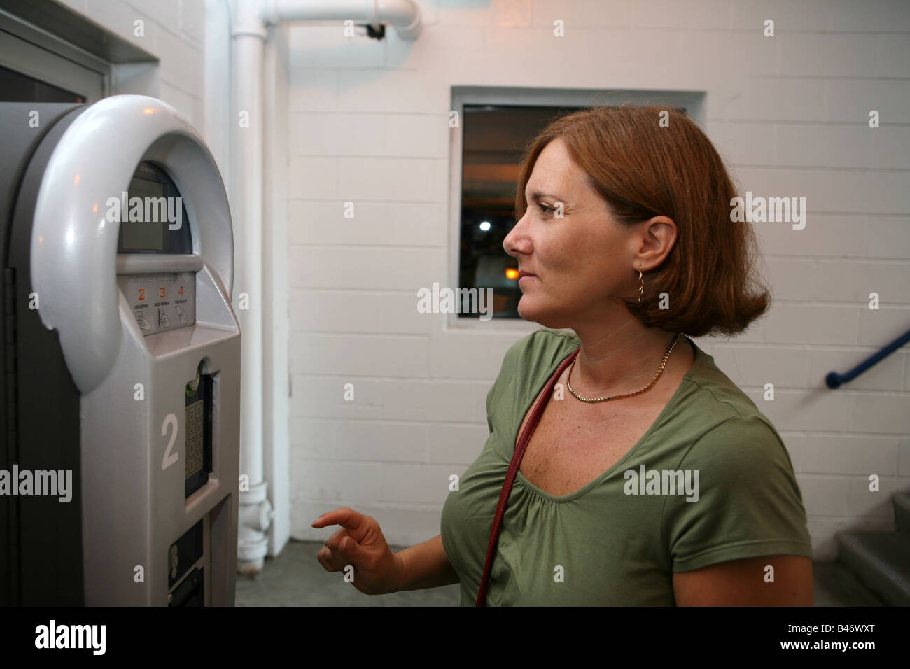 Woman car park meter hi-res stock photography and images - Alamy