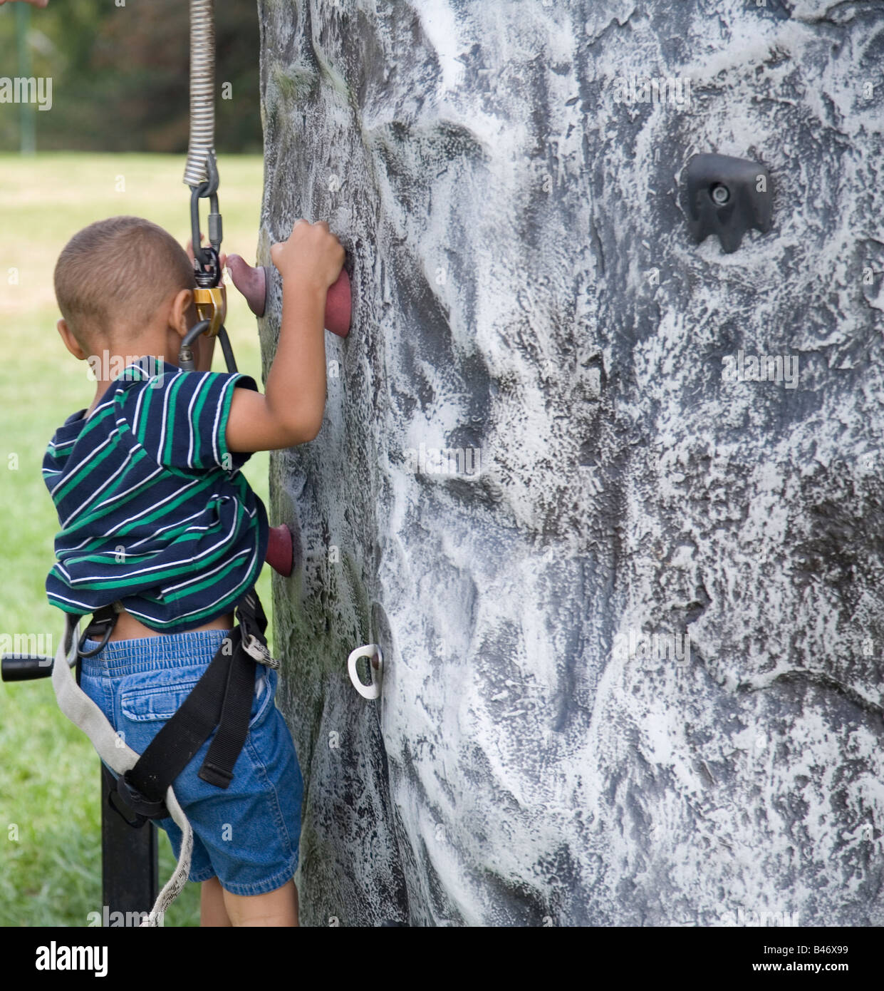 Learning to climb Stock Photo - Alamy
