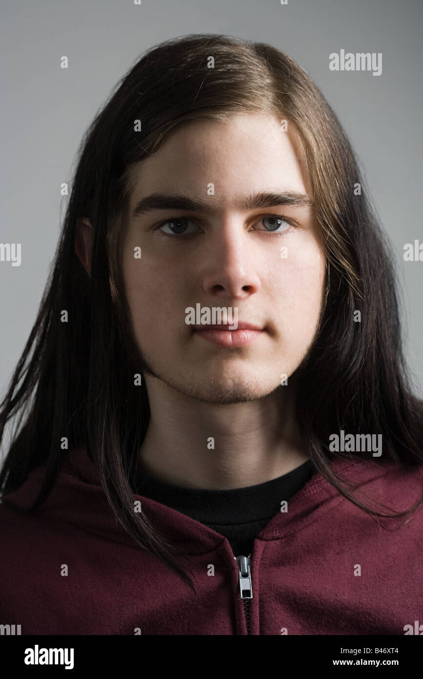 Young man with long hair Stock Photo - Alamy