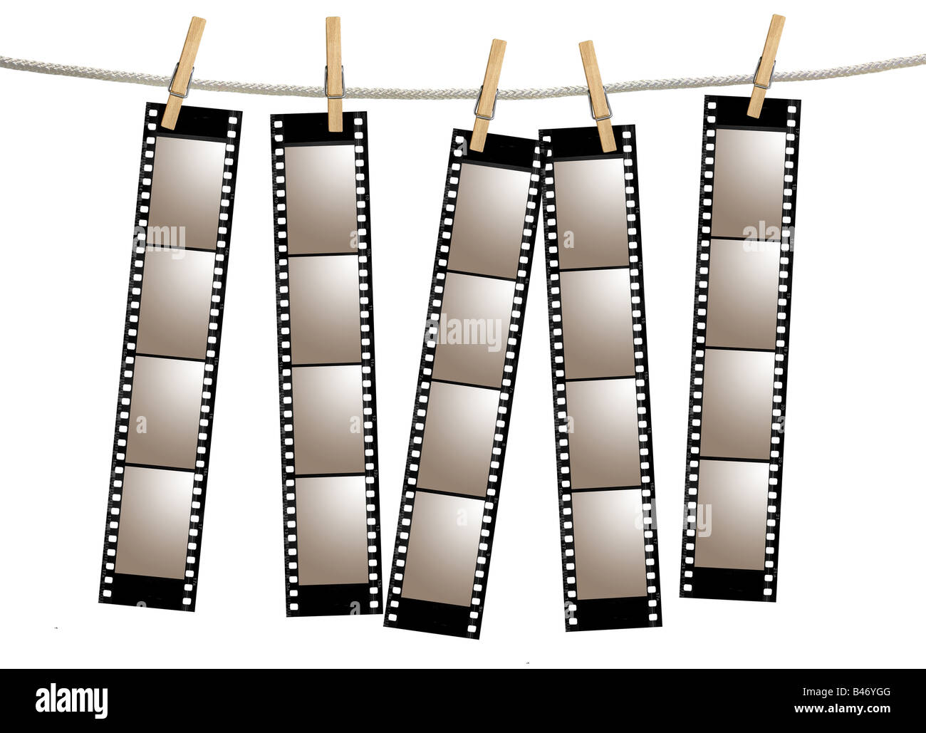 Blank 35mm Film Strip Negatives Hanging From A Rope By Clothespins ...