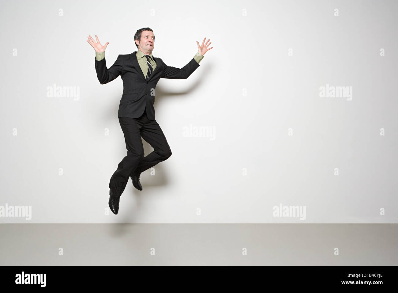 Office worker jumping hi-res stock photography and images - Alamy
