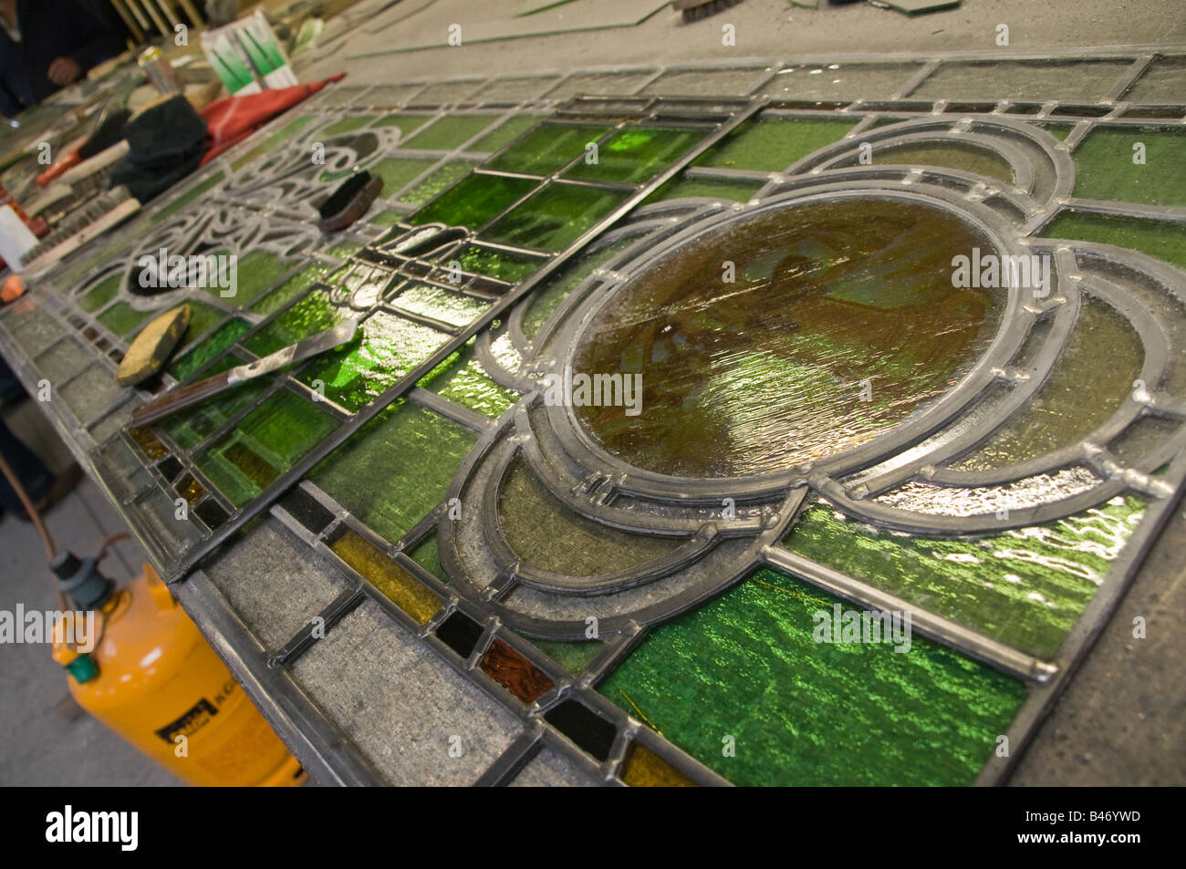 Restoring an old stained glass church window Stock Photo - Alamy