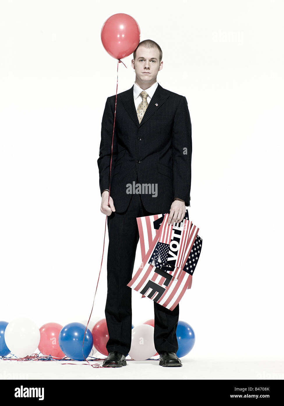 Man with balloons and signs Stock Photo - Alamy