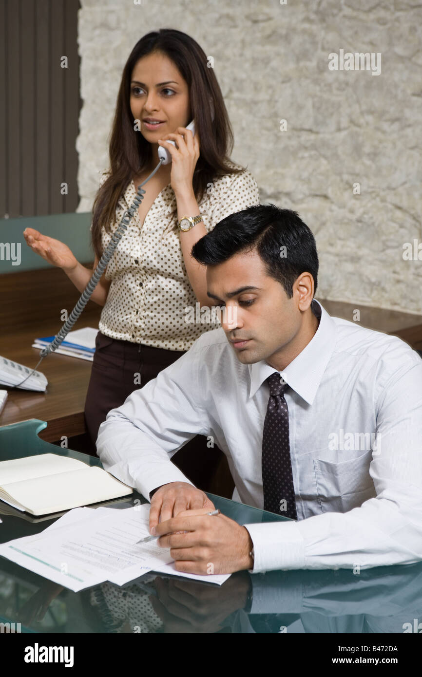 Two indian office colleagues Stock Photo - Alamy