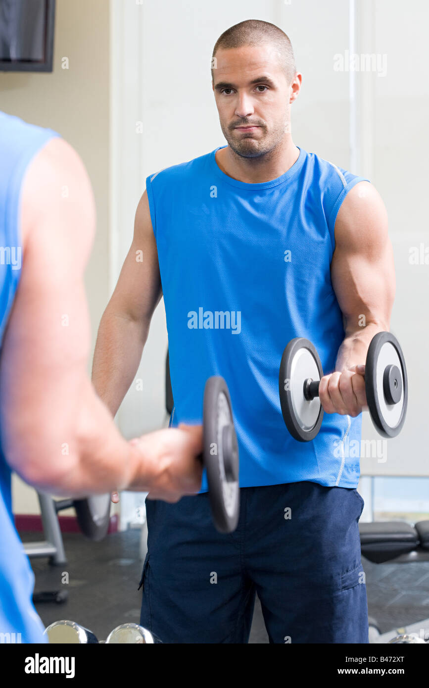 Man with dumbbell Stock Photo - Alamy
