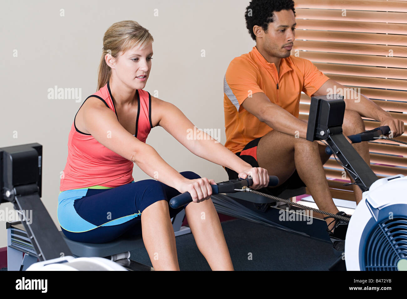 Male Using Rowing Machine High Resolution Stock Photography and Images ...