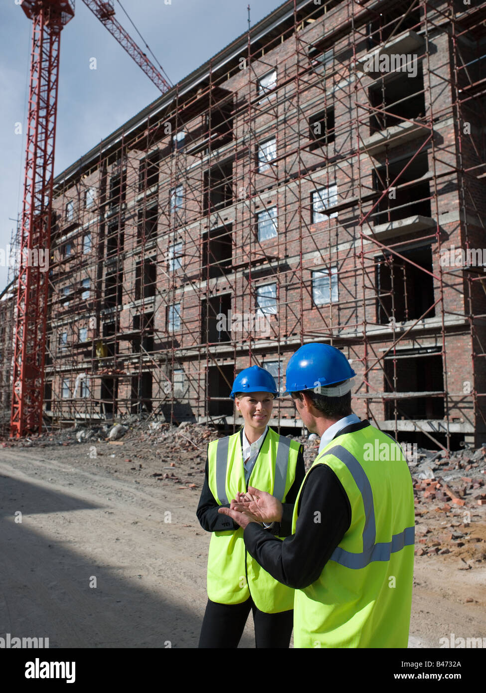 Engineers on building site Stock Photo - Alamy