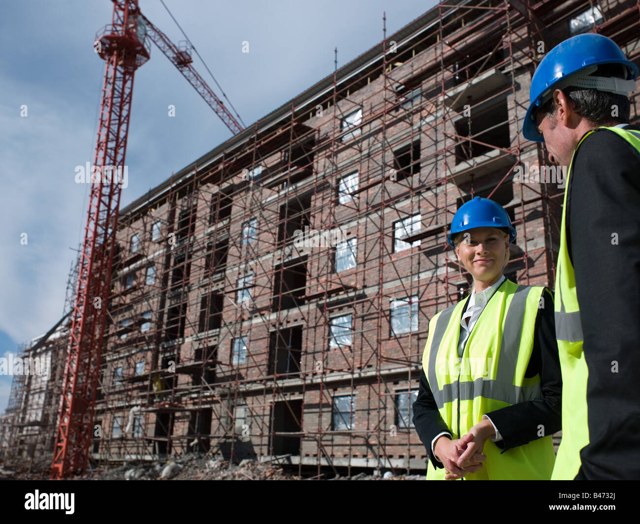 Engineers on building site Stock Photo - Alamy