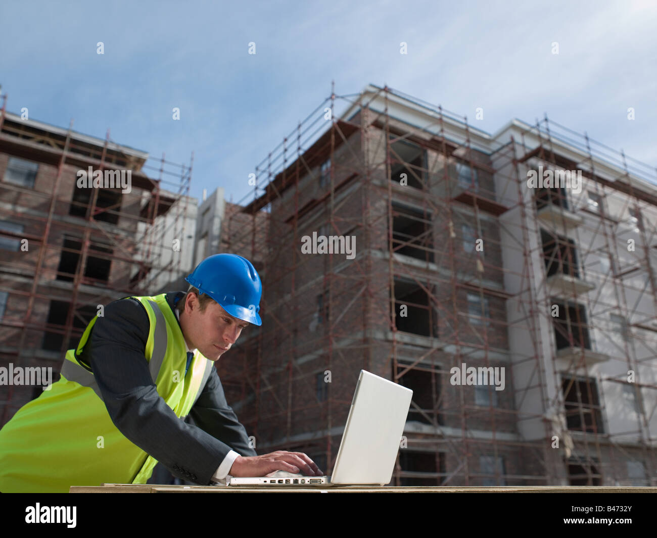 Engineer with laptop Stock Photo - Alamy