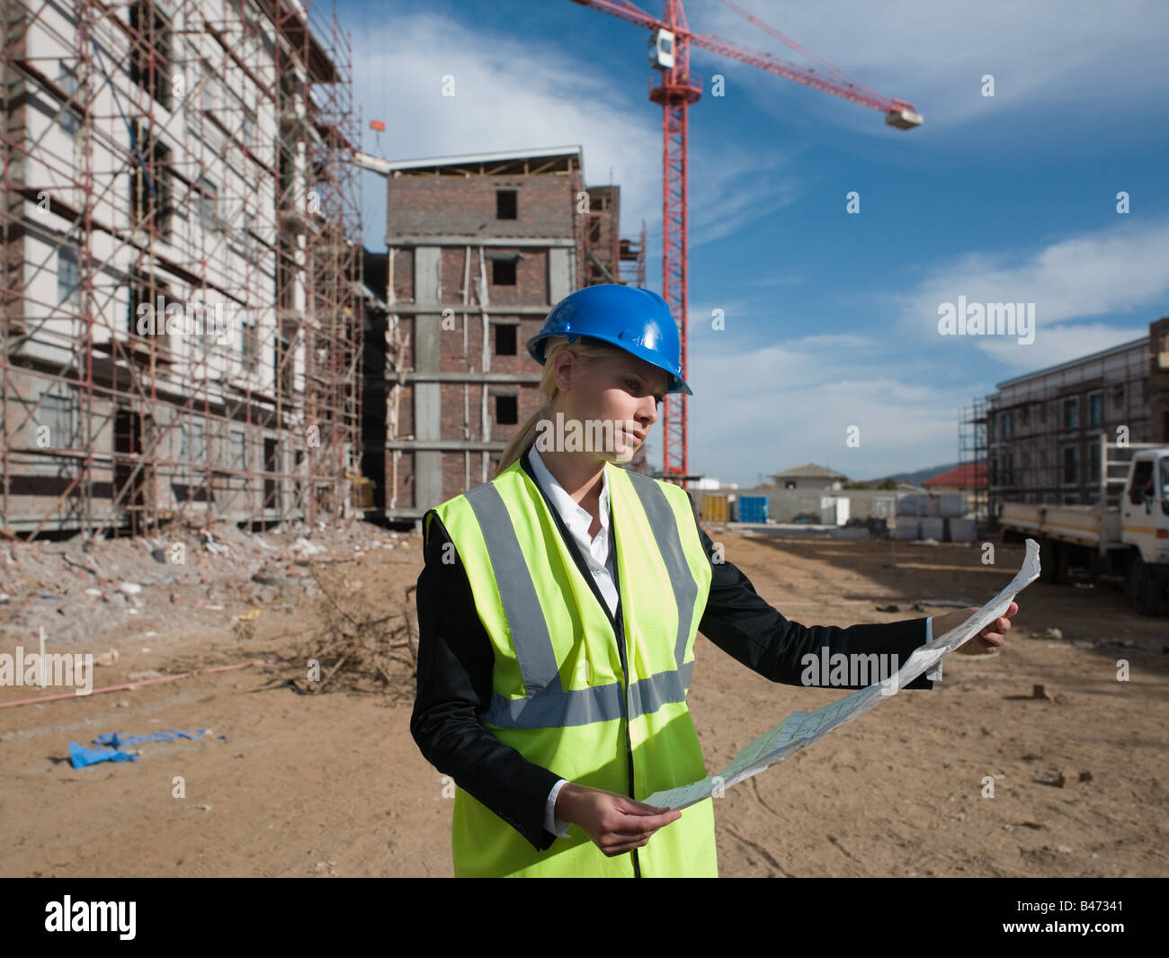 Architect on building site Stock Photo - Alamy