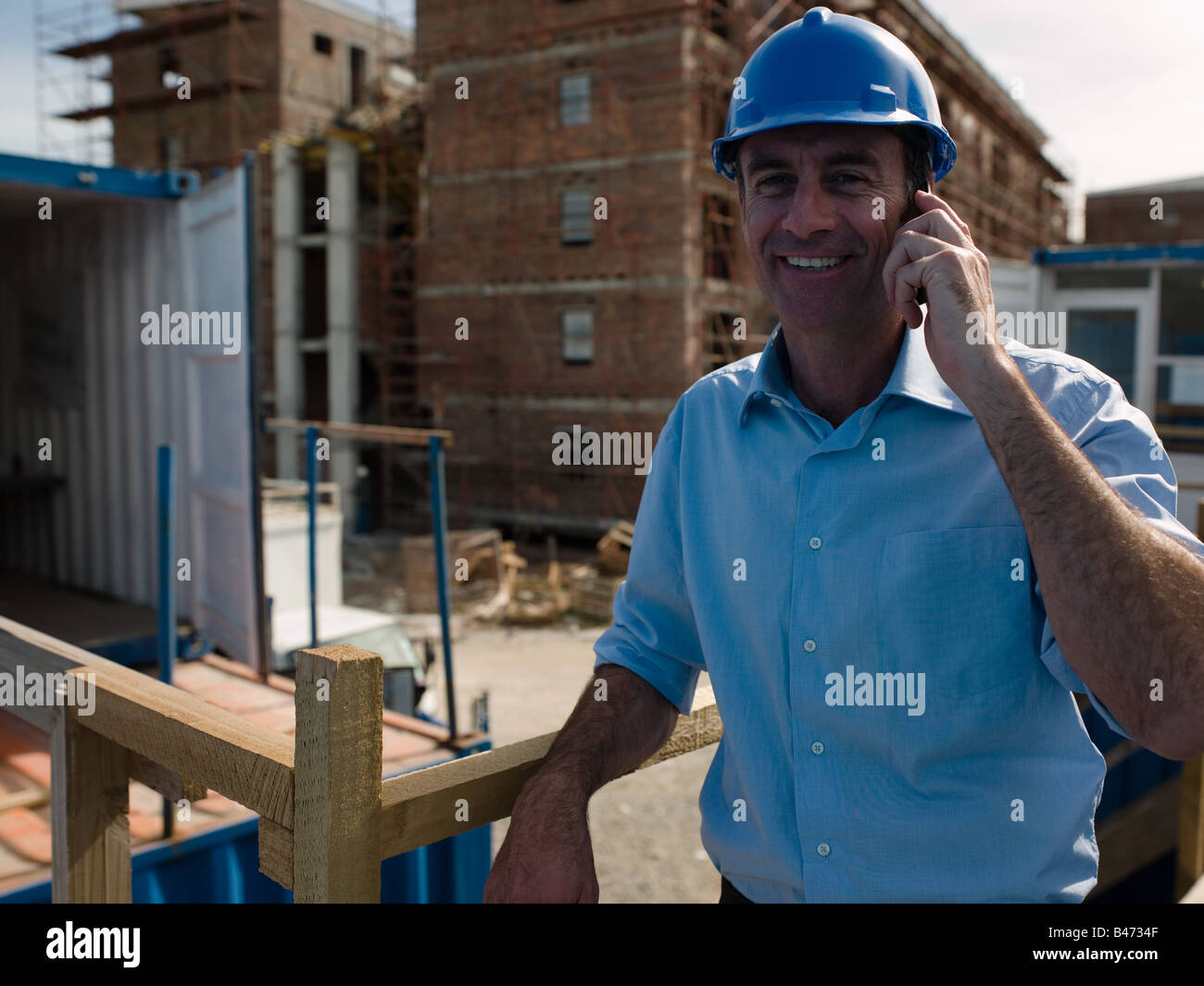 Engineer on cellphone Stock Photo - Alamy