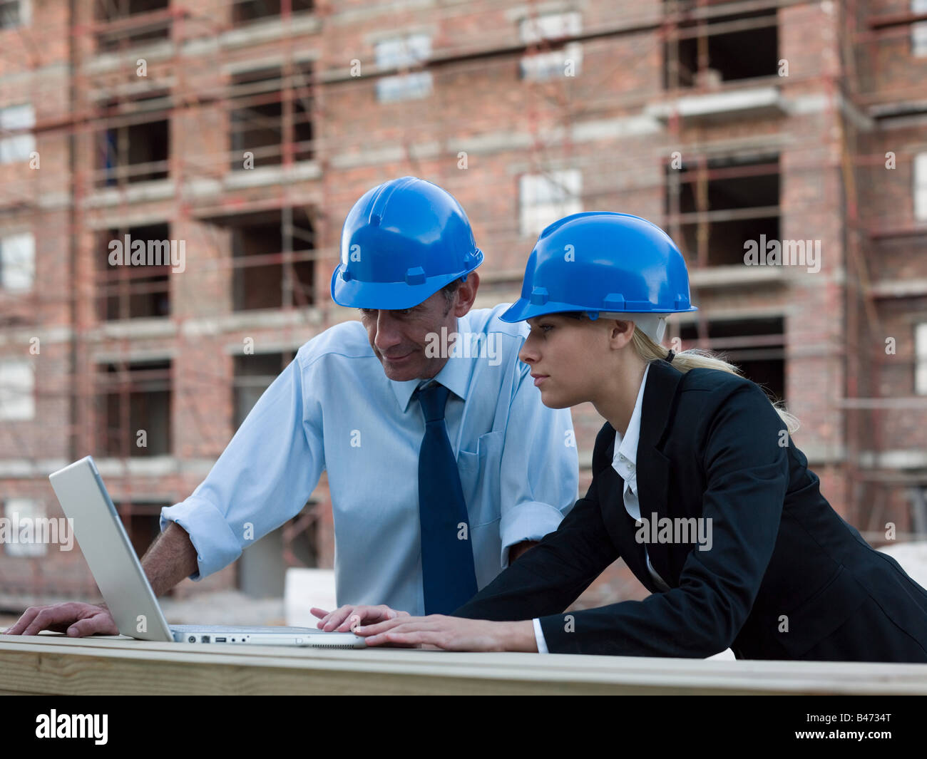 Engineers on building site Stock Photo - Alamy