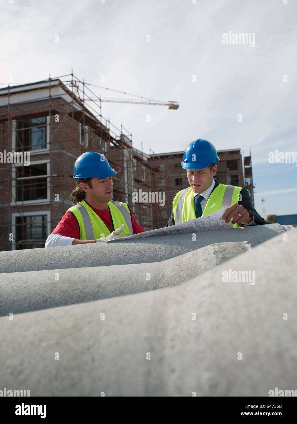 Engineers on building site Stock Photo - Alamy
