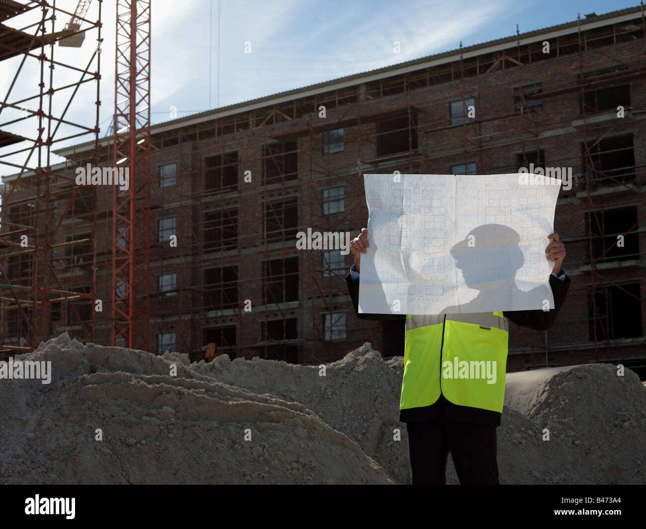 Architect on building site Stock Photo - Alamy