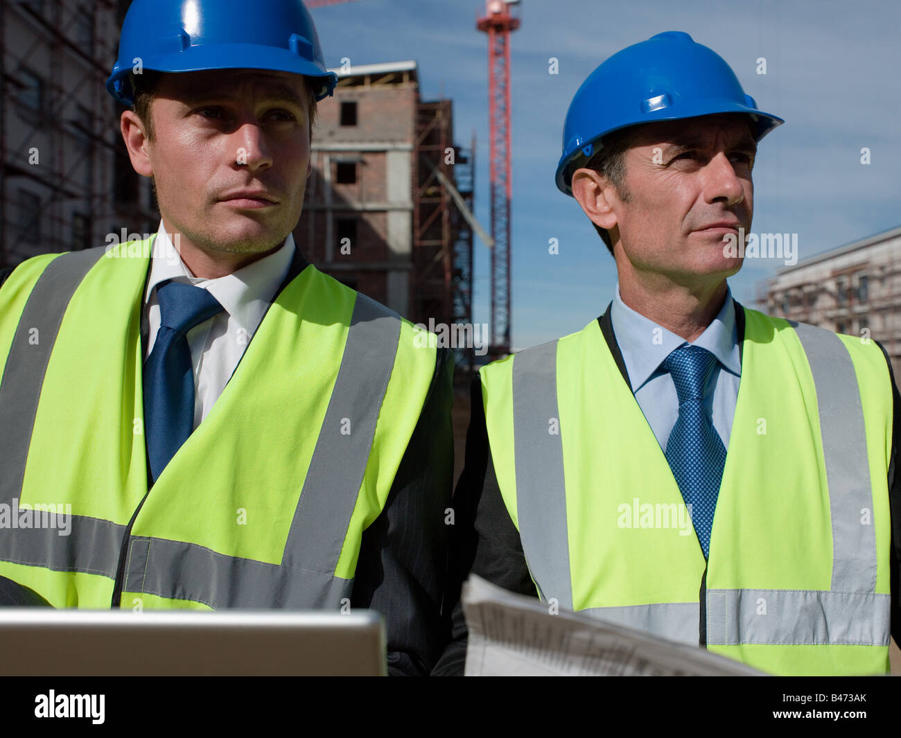Engineers on building site Stock Photo - Alamy