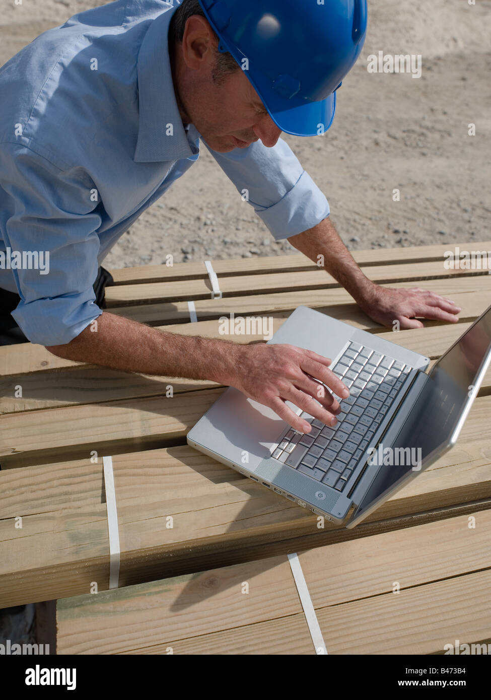 Engineer with laptop Stock Photo - Alamy