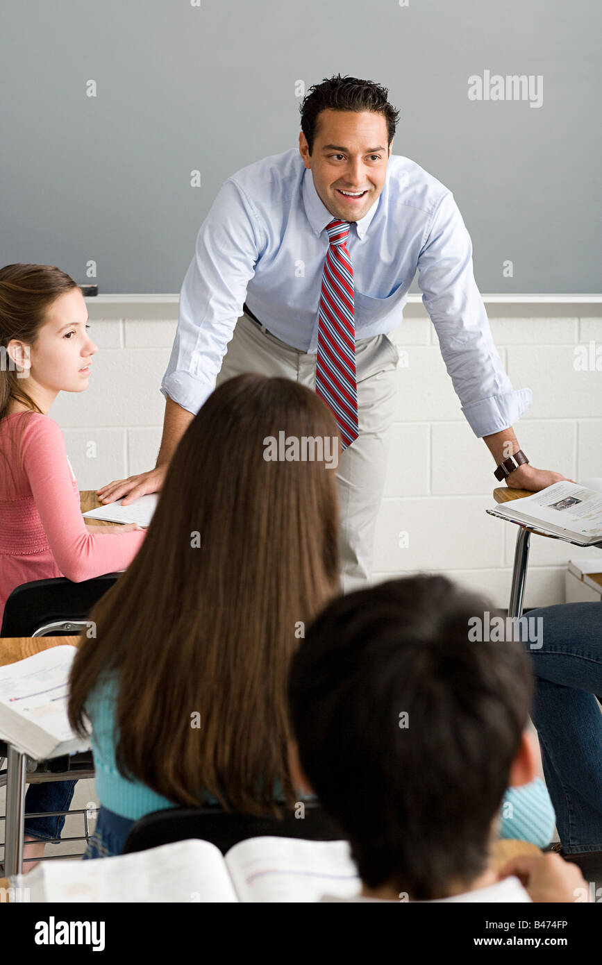 A teacher talking to his class Stock Photo - Alamy