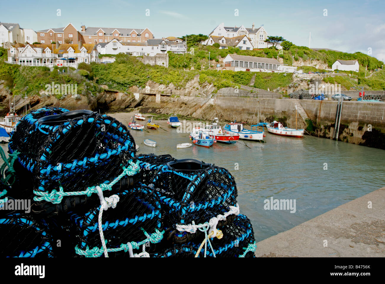 new, modern lobster pots on the harbour wall at newquay,cornwall,uk ...
