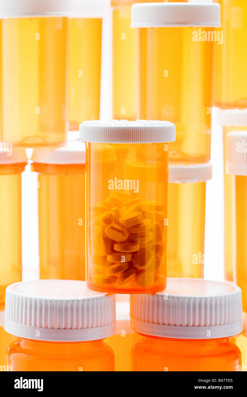 Tablets in a container Stock Photo - Alamy