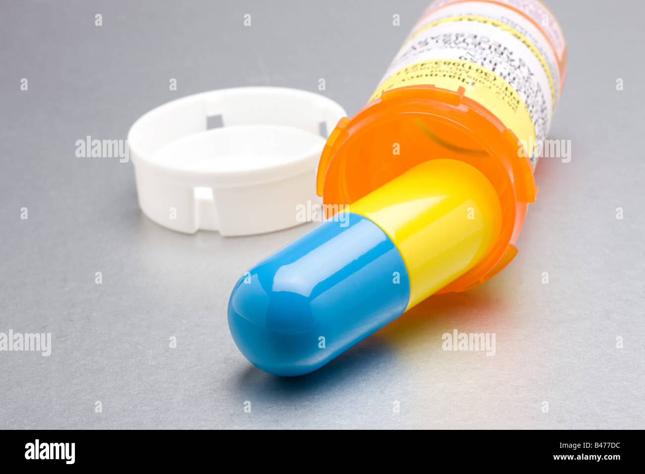 A large tablet and container Stock Photo - Alamy