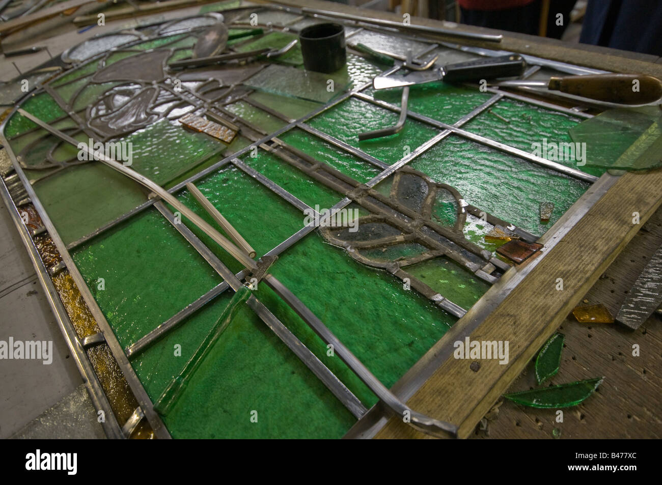Restoring an old stained glass church window Stock Photo - Alamy