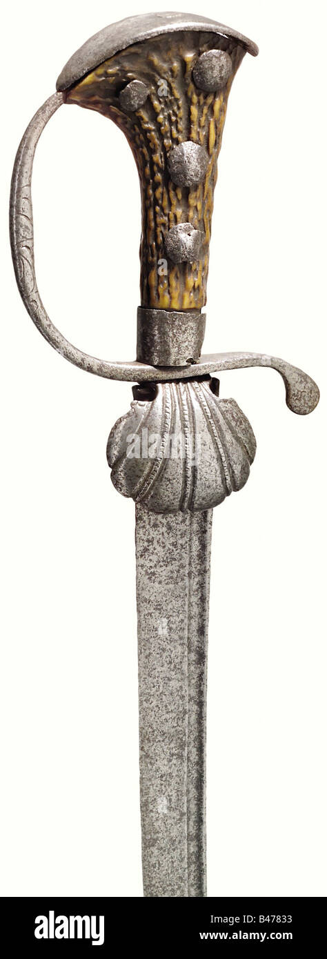 The iron hilt with clamshell and engraved knuckle bow hi-res stock ...