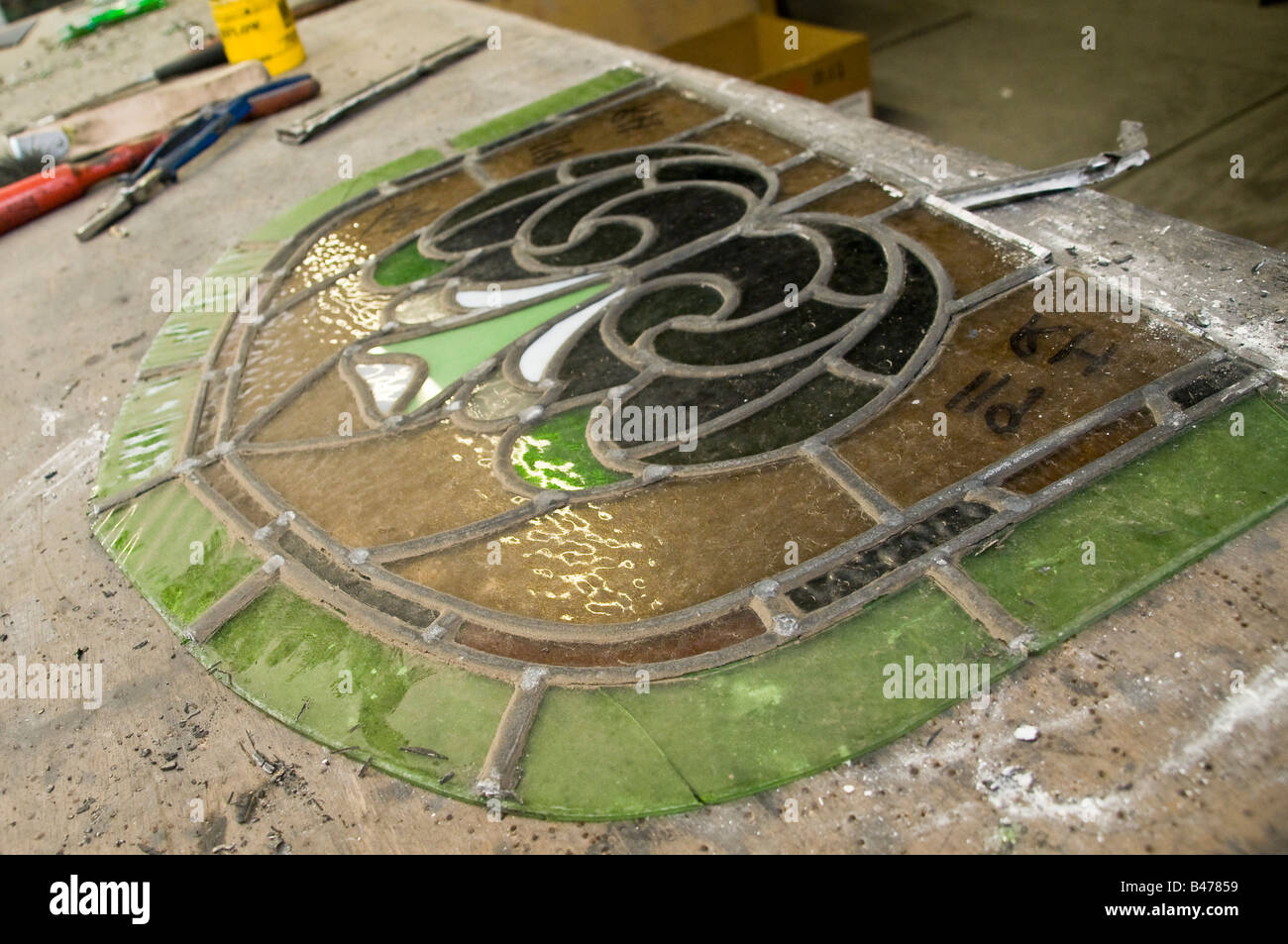 Restoring an old stained glass church window Stock Photo - Alamy