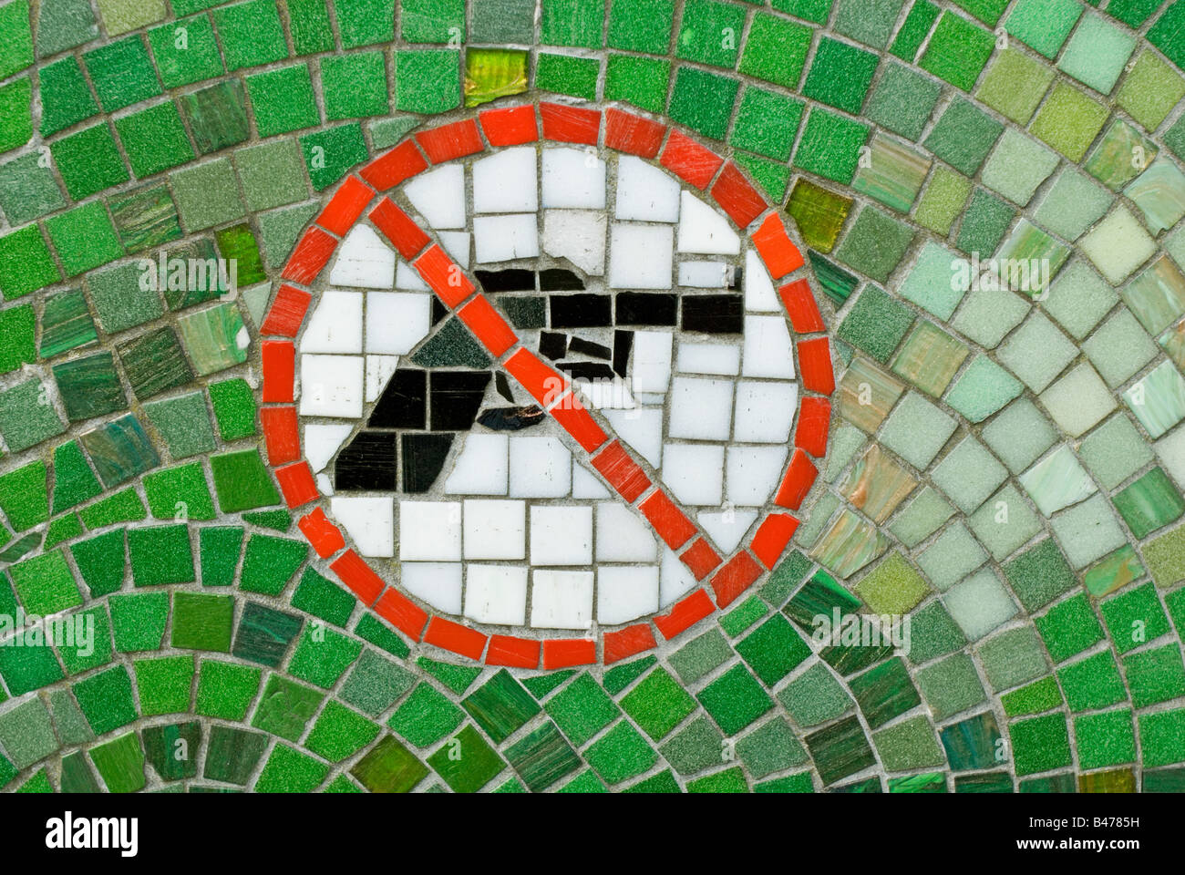 A detail of a public mosaic mural showing an anti gun symbol From a ...
