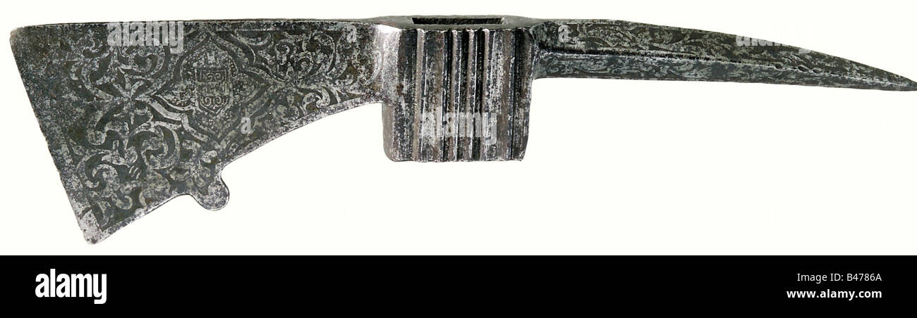 An etched axe head, German, circa 1600. Slender blade with straight ...