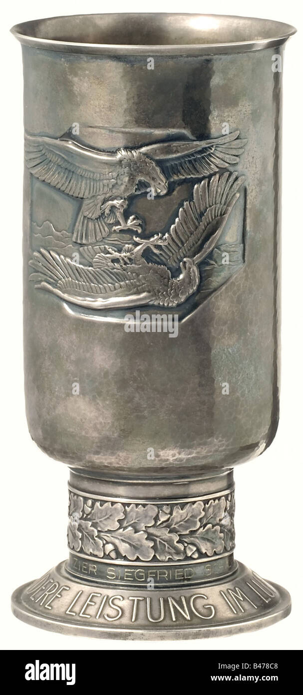 A trophy cup for outstanding performance of duty in aerial combat ...