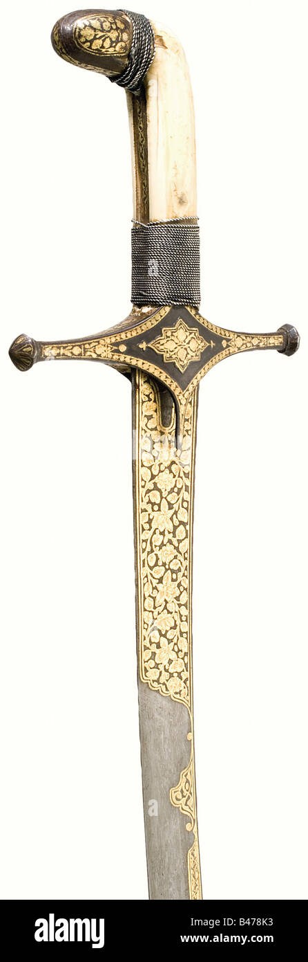 A gold inlaid shamshir, Persian, circa 1800. Curved single-edged blade ...
