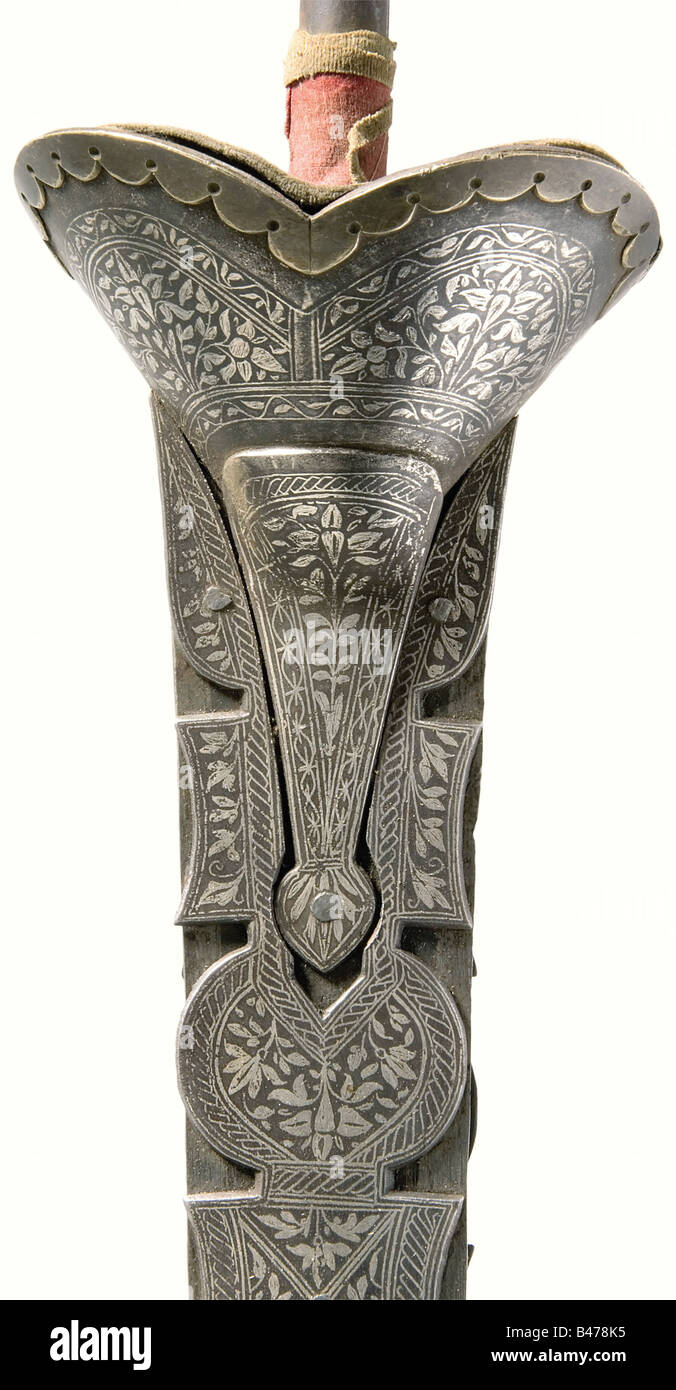 A ritual sword, South India, 19th century. A long single edged blade ...