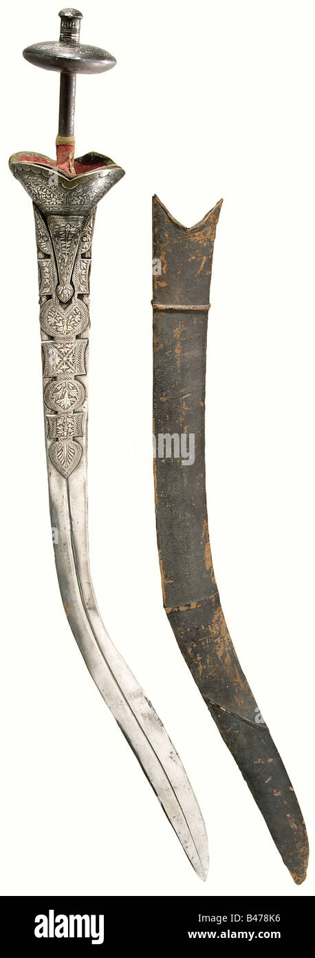 A ritual sword, South India, 19th century. A long single edged blade ...