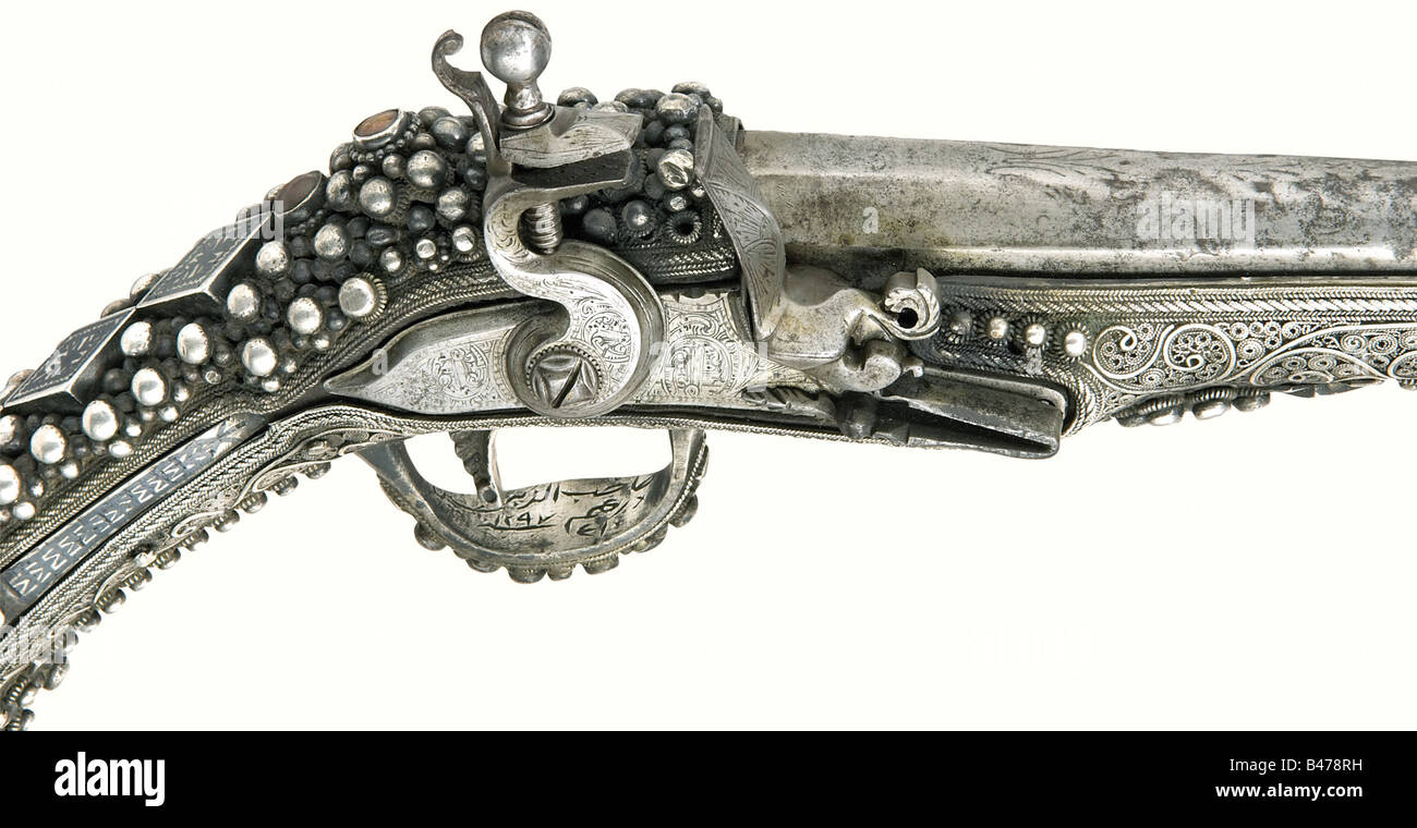 A silver mounted flintlock pistol with suma (ramrod), Ottoman, dated ...