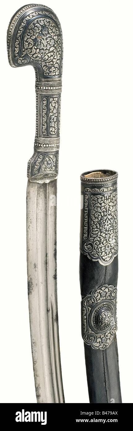A silver mounted shashka, Caucasus, circa 1900. Curved, single edged ...