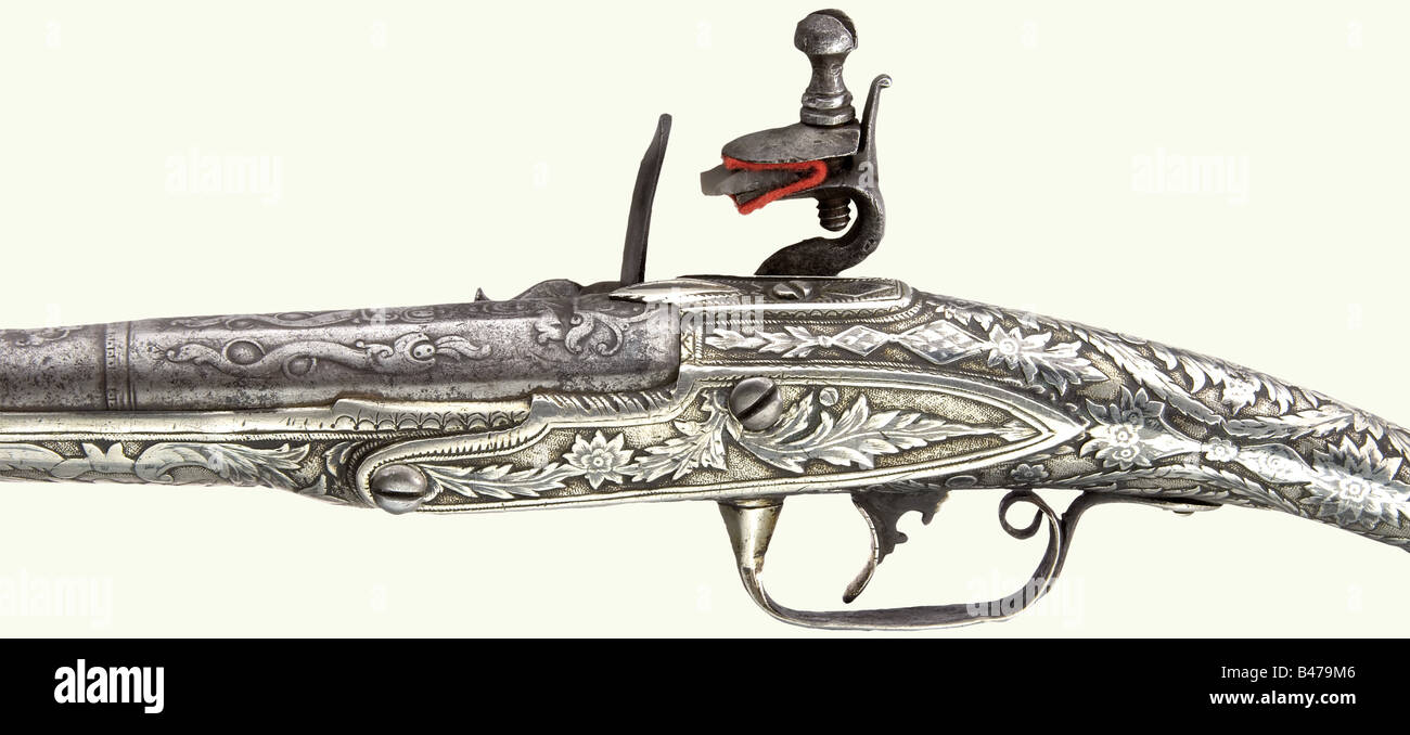 An Ottoman silver-mounted flintlock pistol, circa 1820. Two-stage ...
