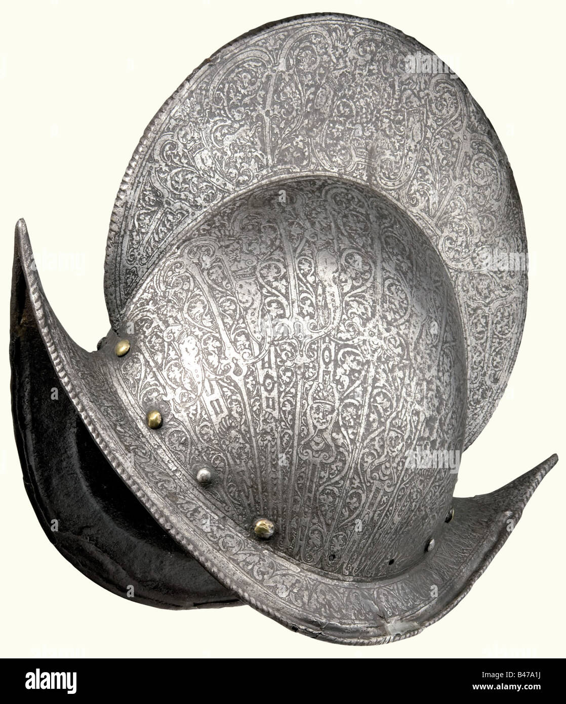 An etched morion, Italy, circa 1590 Skull forged in two pieces with a ...
