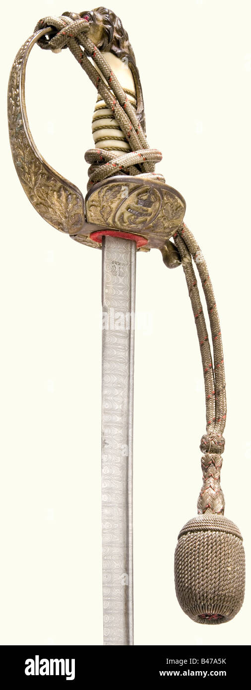 A naval officer's sabre, with a Damascus blade A slightly curved ...