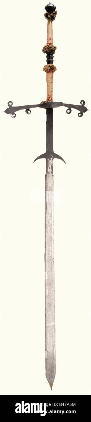A two-handed sword, German, circa 1580 A heavy, cutting blade ...