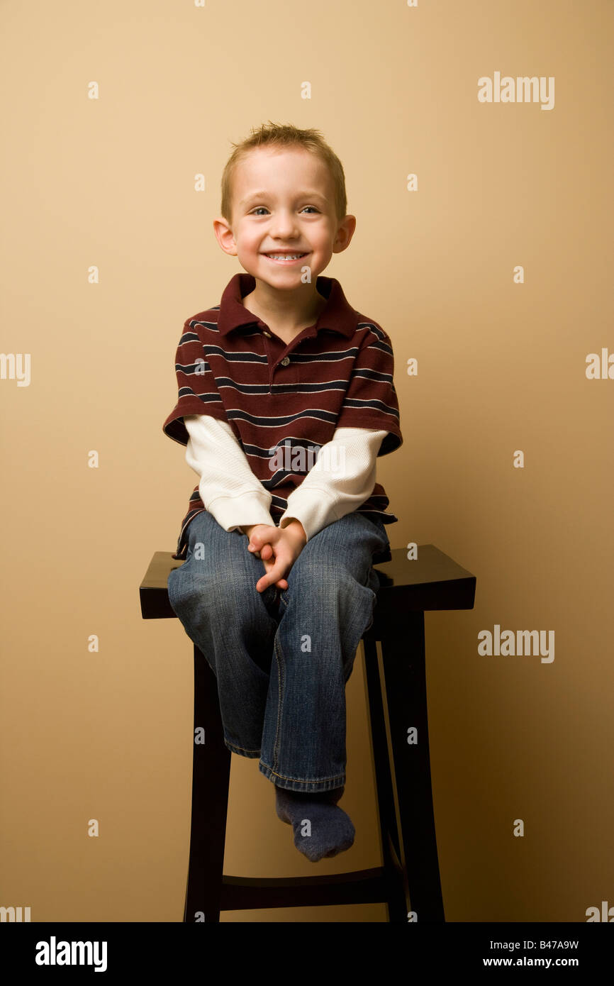 Seating boy hi-res stock photography and images - Alamy